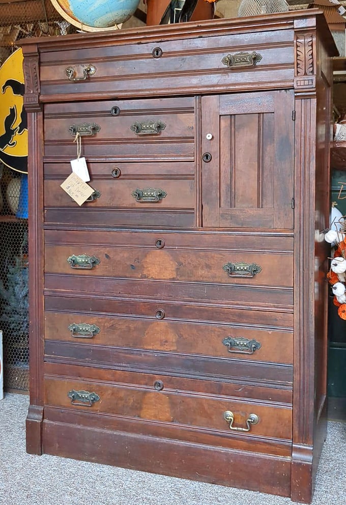 This isn't just furniture—it's a wooden aristocrat. The kind of dresser that makes your IKEA pieces hang their particle-board heads in shame.