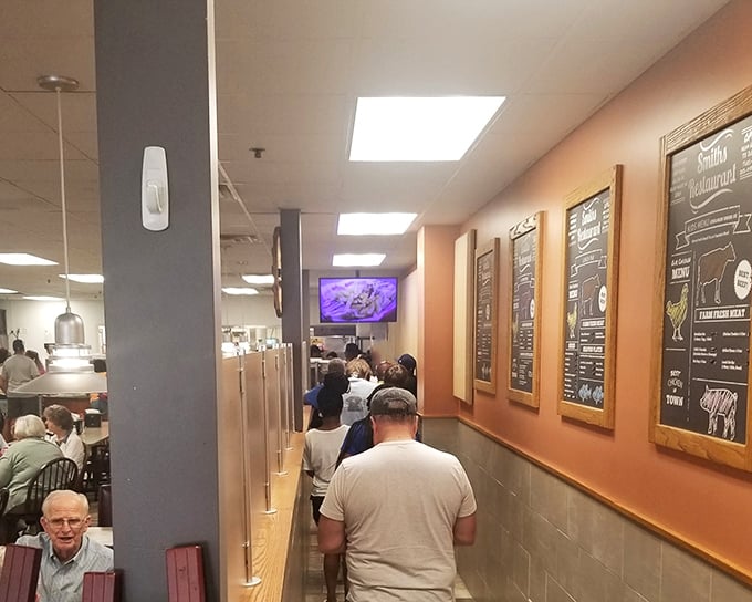 The hallway to happiness is lined with chalkboard menus detailing cuts of meat – a carnivore's roadmap to satisfaction.