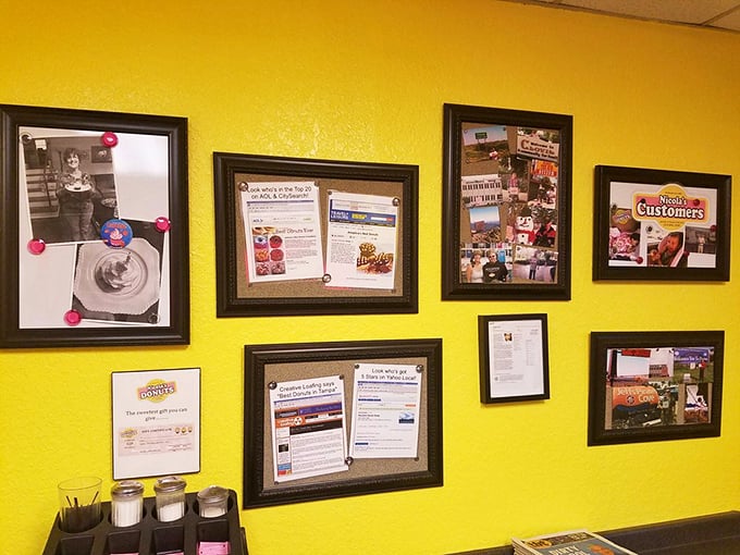 A wall of memories and accolades that tells the story of a Tampa institution, where donuts aren't just made—they're celebrated.