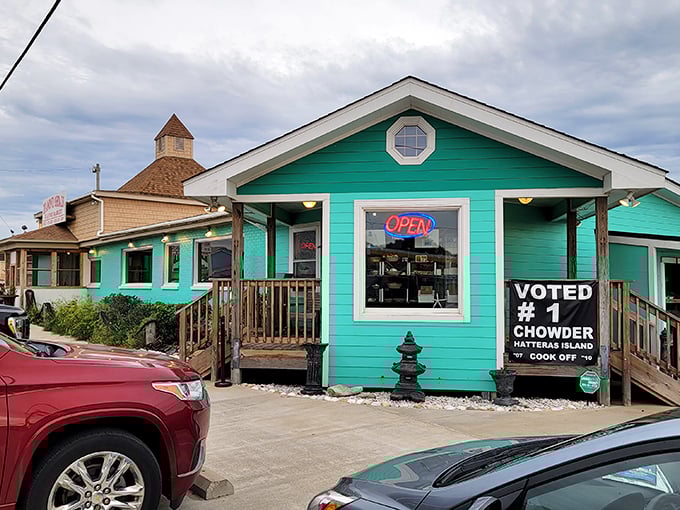 Waterman's Grill's turquoise facade isn't just a building—it's an invitation to seafood paradise. That "Voted #1 Chowder" sign isn't just bragging, it's a promise.