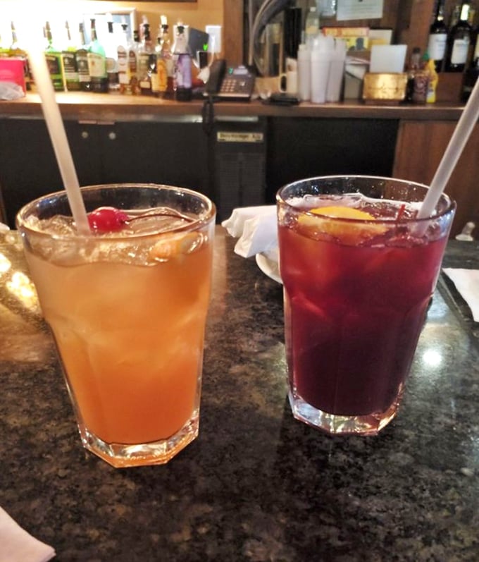 Sangria two ways—one sunset orange, one berry red—both promising a sweet escape from whatever Monday threw your way.