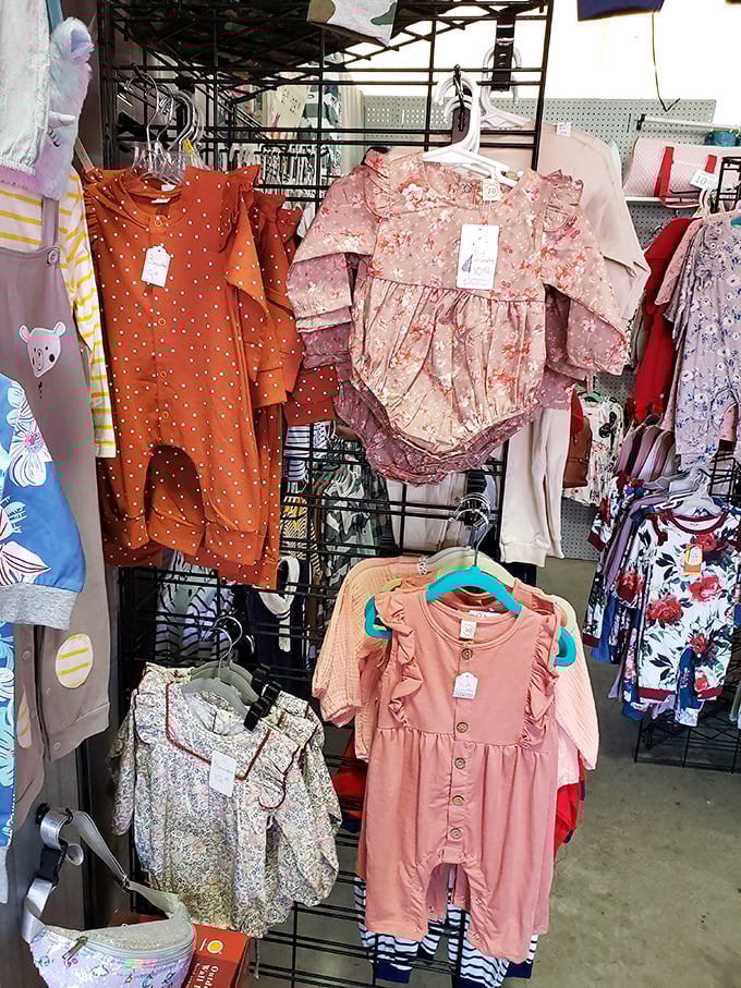 Tiny fashion statements hang in perfect rows. These baby clothes aren't just adorable—they're future first birthday photo opportunities waiting to happen.