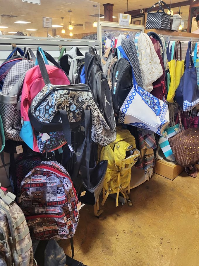 Backpack bonanza! School supplies and travel gear hanging like colorful fruit, ripe for the picking at a fraction of retail prices.