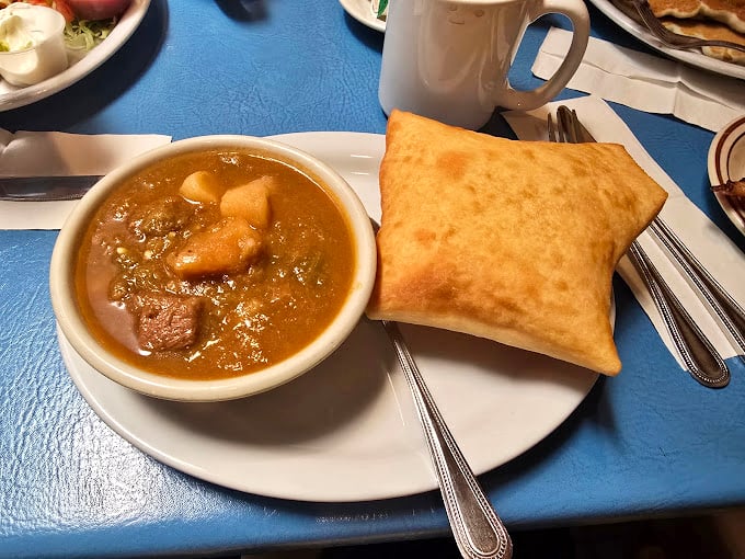 Stew and sopaipilla – the New Mexican version of soup and sandwich. One spoonful and you'll understand why locals consider this comfort food royalty.