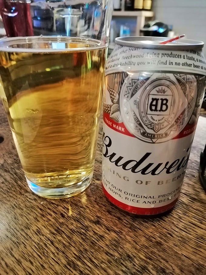 Sometimes the simplest pleasures are best—a cold Budweiser waiting patiently to wash down whatever Italian-American delight you've chosen.
