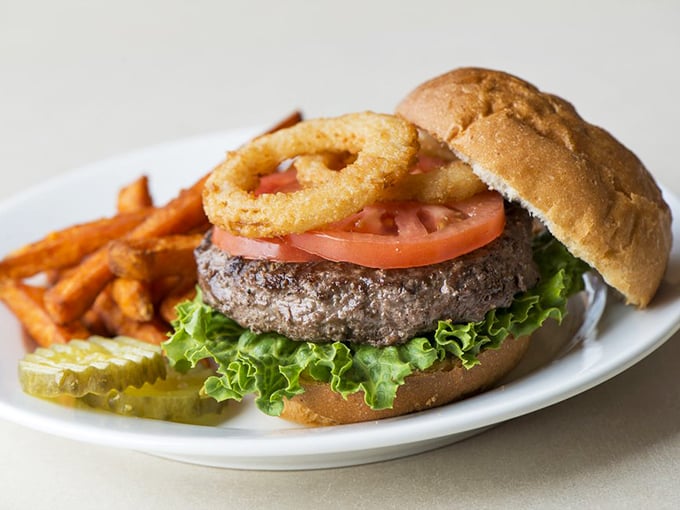 The burger that launched a thousand road trips. Those sweet potato fries aren't just sides—they're supporting characters in this delicious drama.