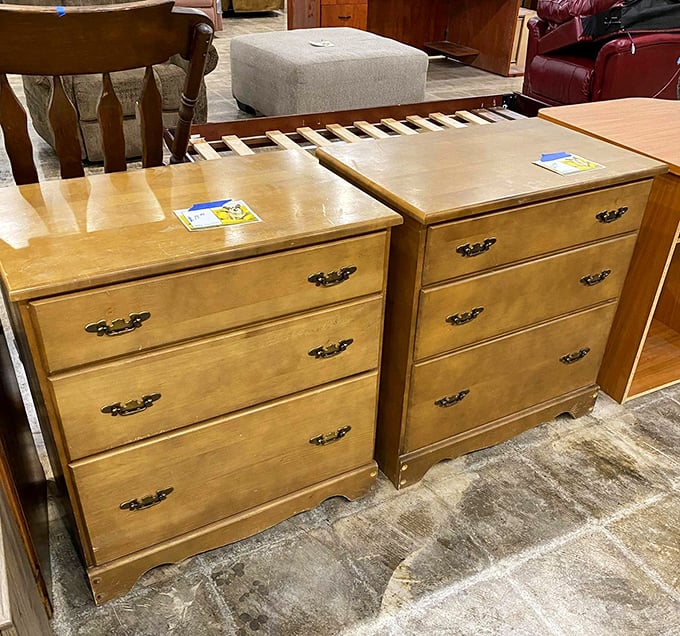 Twin dressers stand at attention, their honey-colored wood and brass hardware whispering tales of bedrooms past.