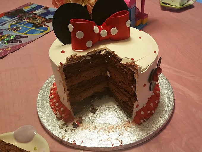 A Minnie Mouse cake that reveals layers of chocolate perfection inside—proof that character cakes can be both adorable and delicious.