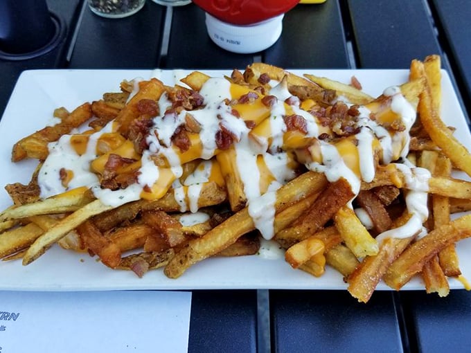 These aren't just cheese fries—they're a masterclass in indulgence, with every calorie earning its place on the plate.