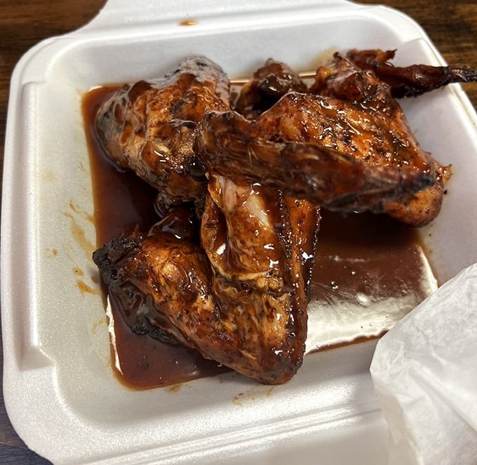 These smoked wings aren't just cooked, they're transformed—bathed in sauce and smoke until they reach barbecue nirvana.