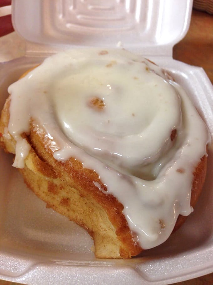 This cinnamon roll isn't just breakfast—it's motivation to get out of bed. That icing doesn't drip; it cascades like a sugary waterfall.