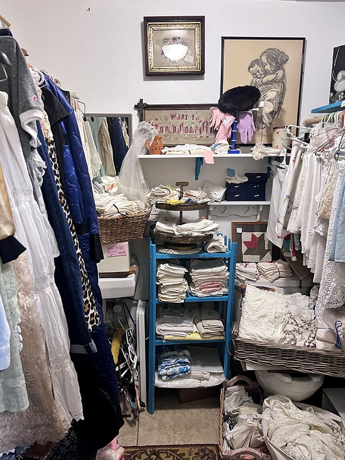 The vintage clothing nook feels like stepping into your stylish great-aunt's closet – where lace, linen, and leopard print tell stories of fashions past.
