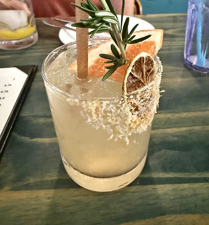 A cocktail garnished with such care you almost feel bad drinking it. Almost.