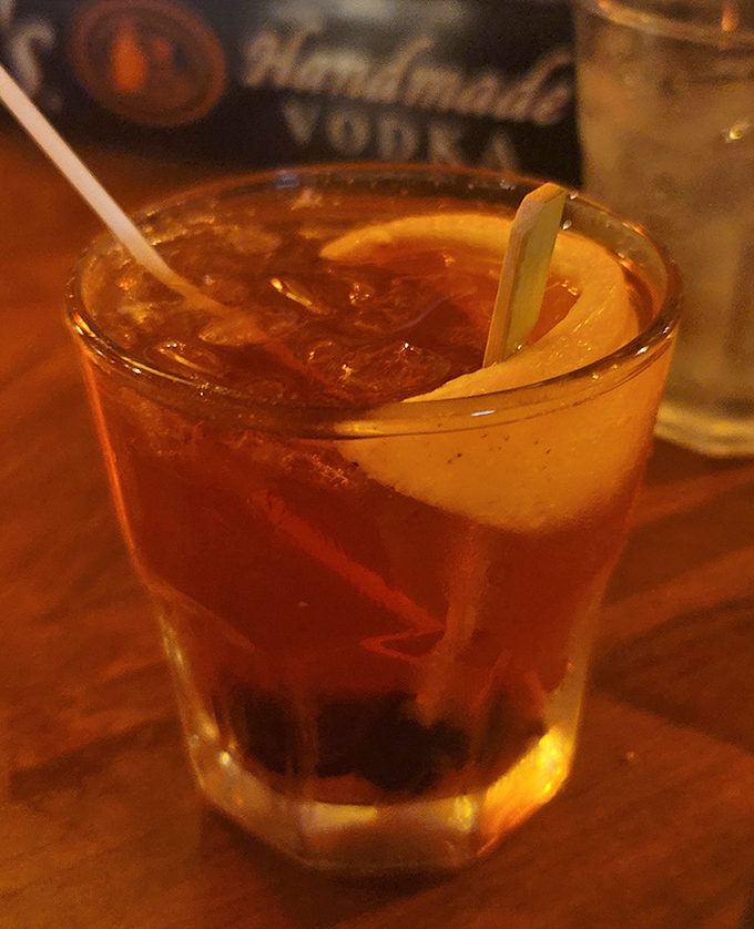 An old fashioned that looks like liquid amber—the kind of cocktail that makes you want to discuss jazz and real estate.