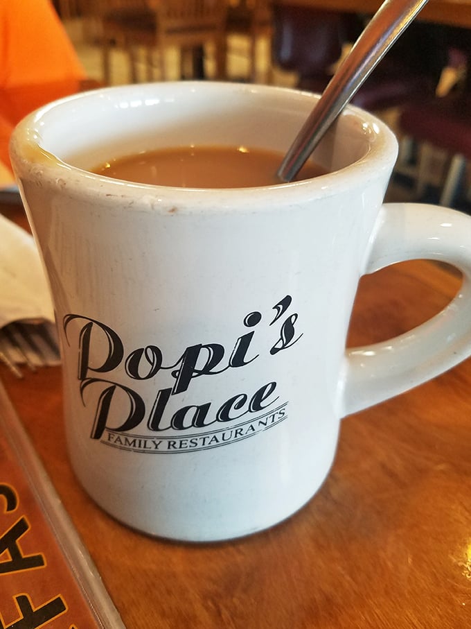 The coffee mug—sturdy, unpretentious, and filled with brew that doesn't need single-origin beans or pour-over techniques to satisfy the morning requirement.