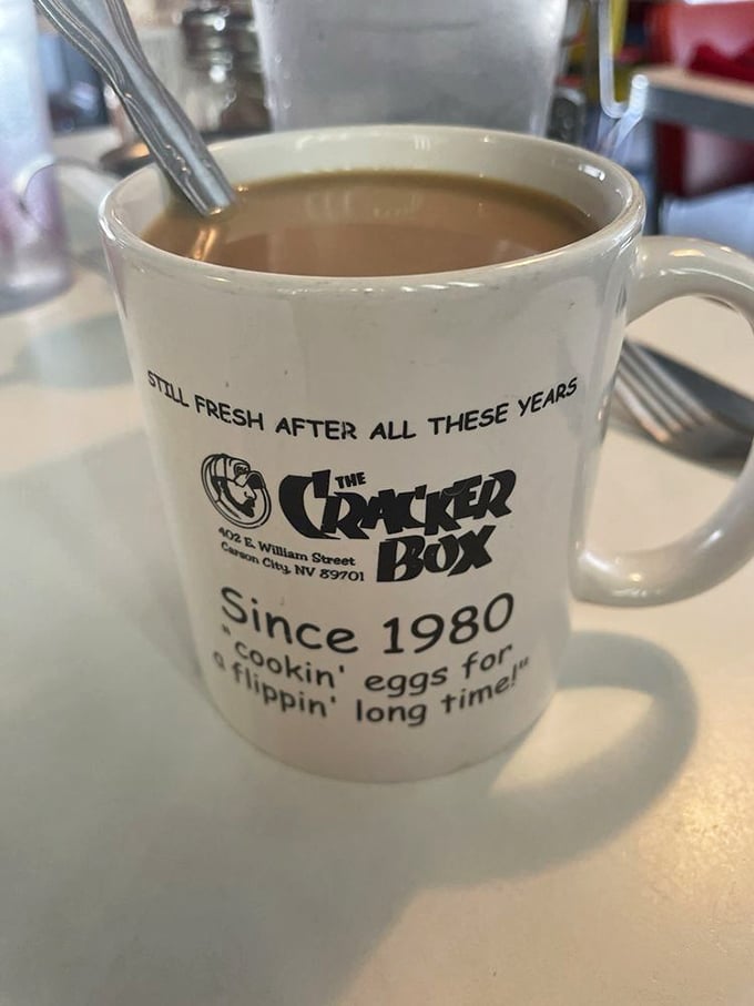 Their coffee mugs tell the story—"Still fresh after all these years"—a humble brag that's completely justified once you take a sip.