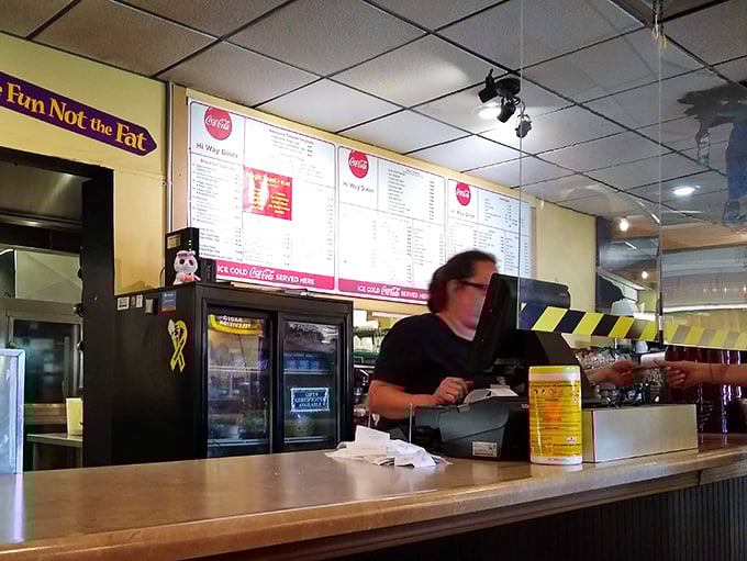 Where the magic happens—the counter where coffee cups are never empty and friendly banter flows as freely as the coffee.