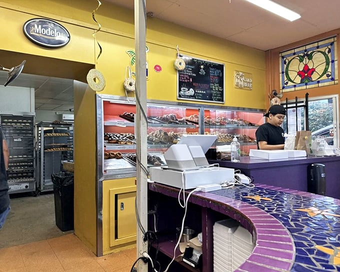 Behind this counter, magic happens daily. No fancy equipment, no pretension – just decades of know-how turning simple ingredients into breakfast gold.