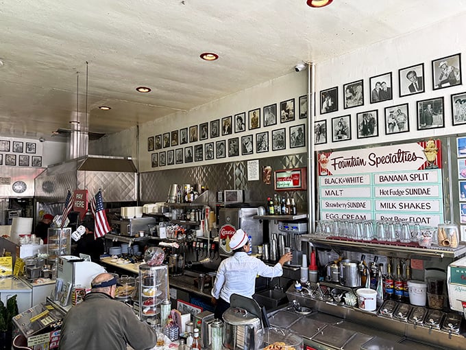 Behind the counter, where the magic happens and black-and-white photos watch over the griddle action.
