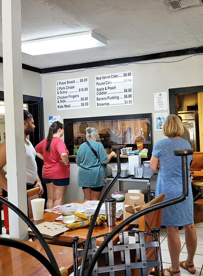 The ordering counter—where dreams come true and diets go to die. Worth every minute in line, every calorie consumed.