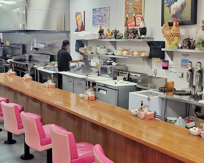 Where the magic happens – the counter seating offers front-row tickets to the breakfast ballet. Pink swivel chairs included at no extra charge.