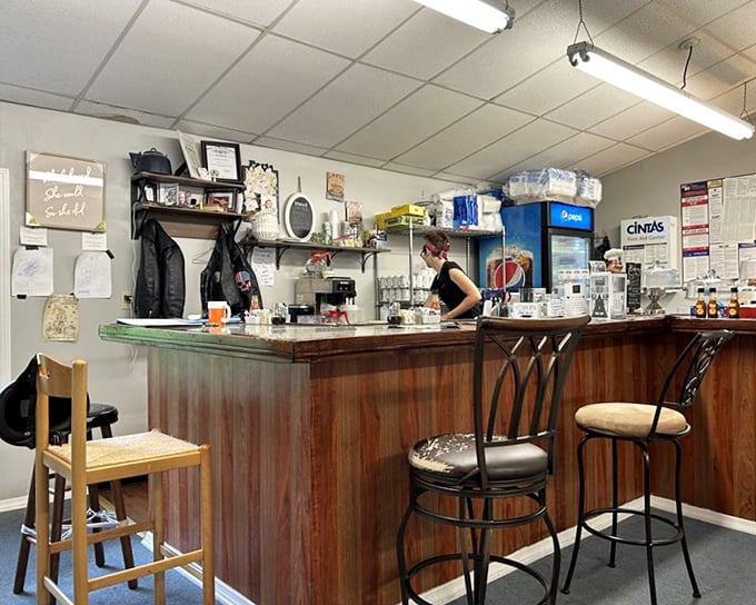 The counter seating offers front-row tickets to the morning show—coffee refills included.