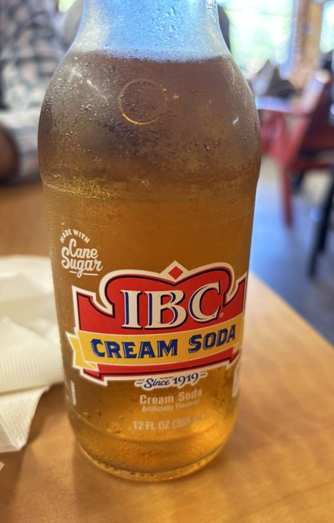 An ice-cold IBC Cream Soda—the beverage equivalent of finding an extra $20 in your pocket. Pairs perfectly with everything on the menu.