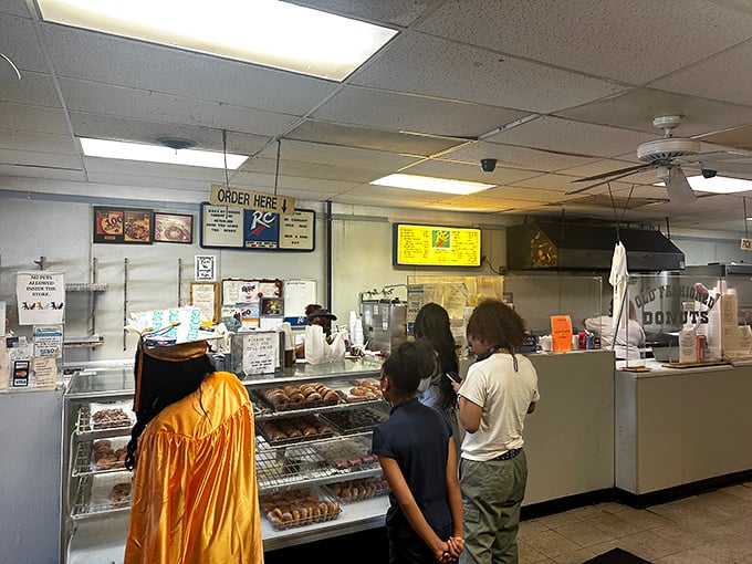 The pilgrimage to the counter—a moment of anticipation where decisions matter. Choose wisely, young padawan.