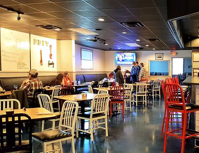 The bustling dining room speaks volumes – when locals pack a place this consistently, you know you've struck culinary gold.