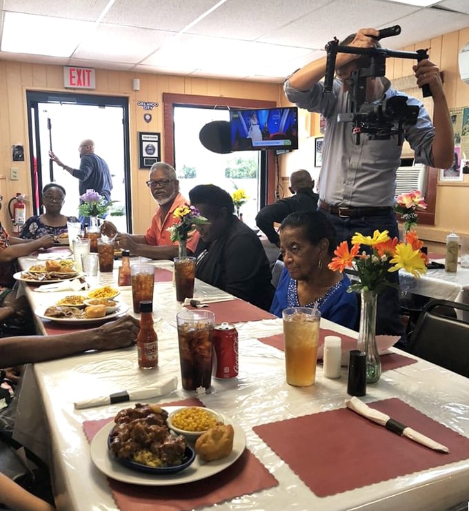 The dining room at Nikki's Place – where cameras occasionally show up because food this authentic can't stay secret forever.