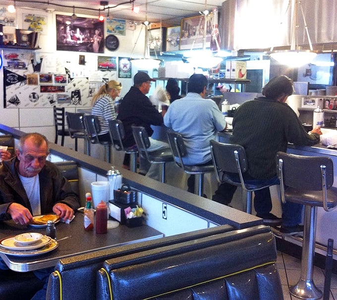 The counter seating at Chubby's offers front-row tickets to the short-order symphony. Where strangers become temporary breakfast companions united by coffee.
