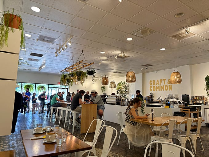 The bustling interior speaks volumes—locals know where to find the good stuff. White chairs and wooden tables create a canvas for culinary joy.