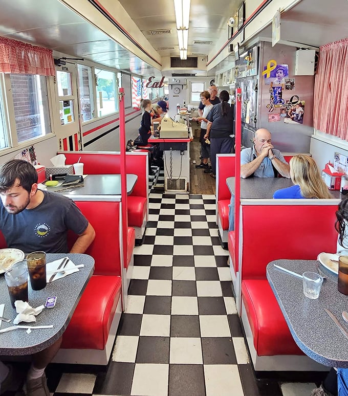 A bustling scene where conversations flow as freely as the coffee, creating that magical diner symphony of clattering plates and morning chatter.