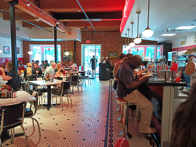 The counter seats fill with regulars and first-timers alike, all united in the universal language of "mmm" and "you've got to try this."