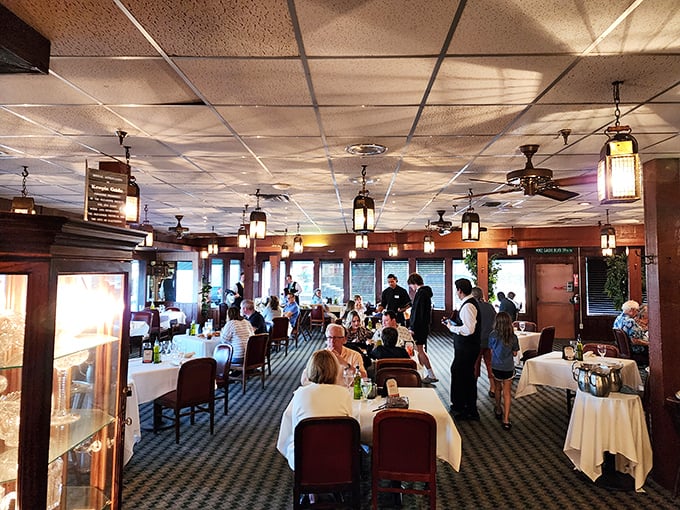 The dining room hums with the universal language of good food—satisfied murmurs, occasional gasps of delight, and the strategic silence of serious eating.