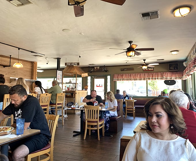Morning light bathes the dining room where locals and travelers alike gather for their daily ritual of coffee and conversation.