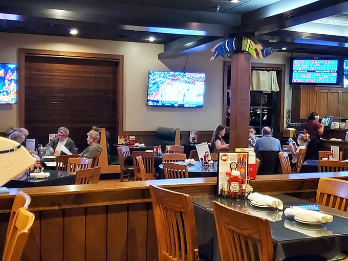 The lively dining area buzzes with conversation and clinking glasses—proof that good food brings people together, even far from any ocean.