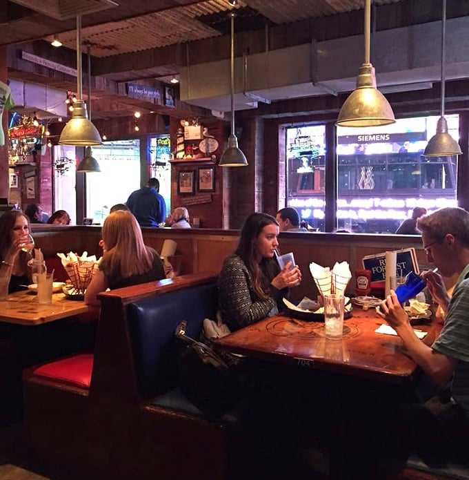 Where strangers become friends over shared tables and seafood stories—the true magic of dining in New York's theatrical heart.