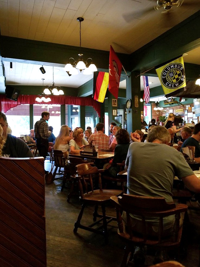 When locals pack a restaurant this consistently, you know you've found the real deal – German flags and Columbus Crew banners adding to the community vibe.