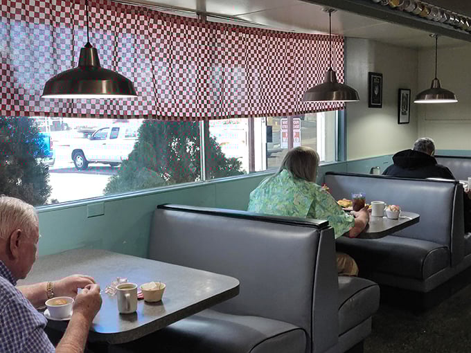 Classic diner booths—where family stories unfold over coffee refills and the world's problems get solved between bites of toast.