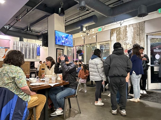 When a restaurant is this packed, it's not just serving food—it's hosting a community event where the admission ticket is an empty stomach.