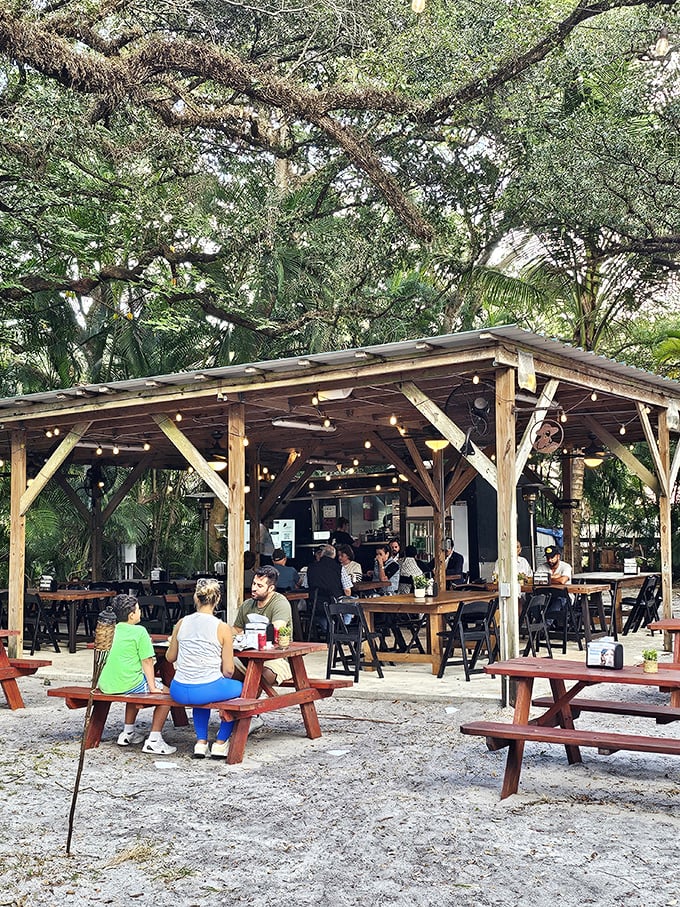 Family-style dining under Florida's natural canopy. Some restaurants have ambiance—this one has atmosphere you can't manufacture.