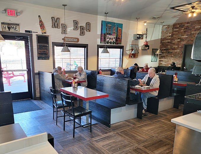The regulars know—these booths have witnessed more barbecue epiphanies and local gossip exchanges than any therapist's couch in Winston-Salem.