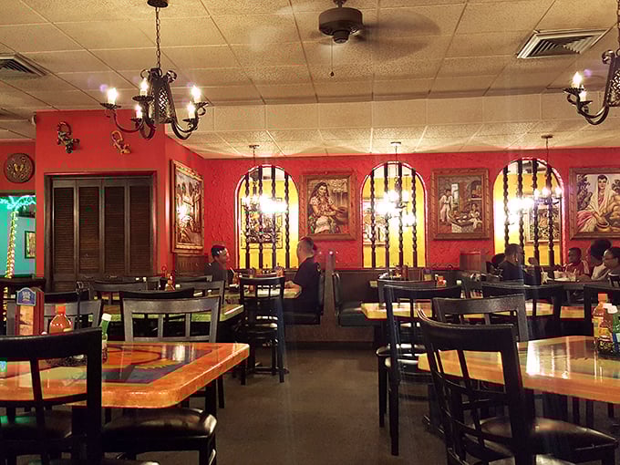 Red walls and traditional artwork create an atmosphere that says, "Yes, you've found the real deal."