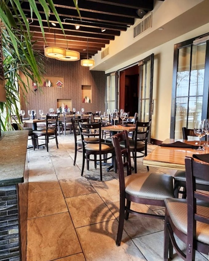 Warm woods, thoughtful spacing, and ambient lighting – a dining room that understands the importance of atmosphere.