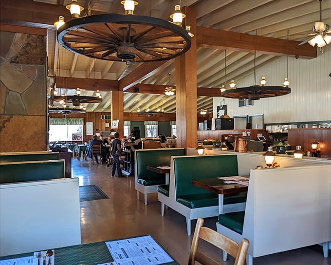 Booths designed for lingering conversations and serious pancake contemplation. The wagon wheels aren't just decor—they're time machines to simpler days.