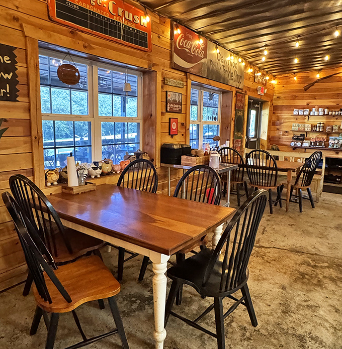 Wooden tables bathed in golden light from string lights overhead—the stage is set for the main event: spectacular barbecue.
