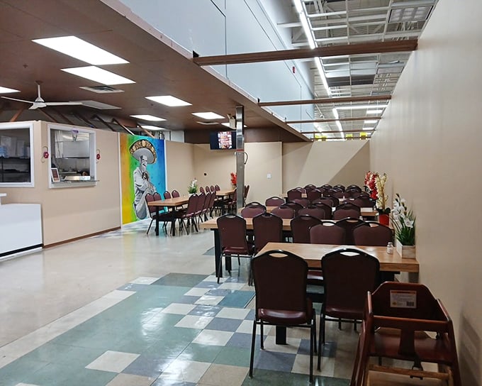 A cafeteria area that understands treasure hunting requires refueling. Simple seating where flea market warriors rest their weary bargain-hunting feet.