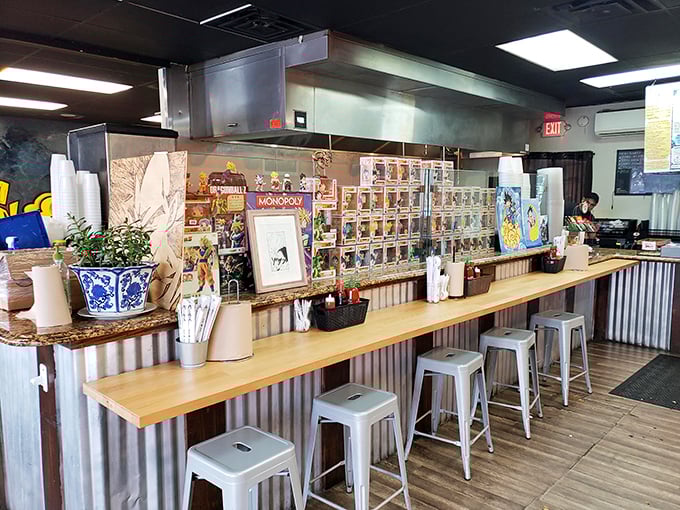 The counter isn't just for ordering—it's a museum of anime culture. Funko Pops and collectibles create a backdrop that's as entertaining as the food.