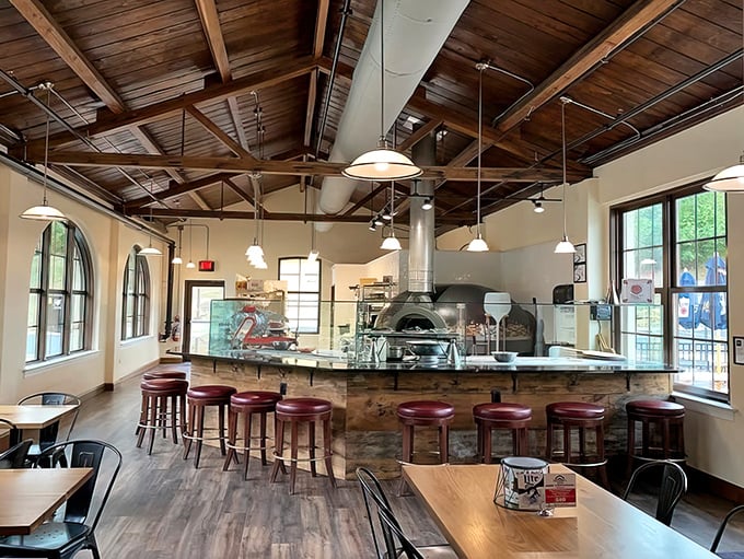The counter seating offers front-row tickets to the greatest show in Wilmington: watching pizza artisans work their magic.